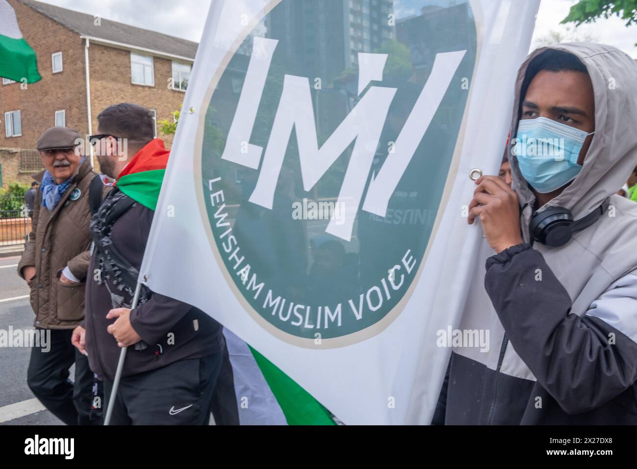London, UK. 20 April 2024. Lewisham Muslim Voice banner. Marchers meet ...