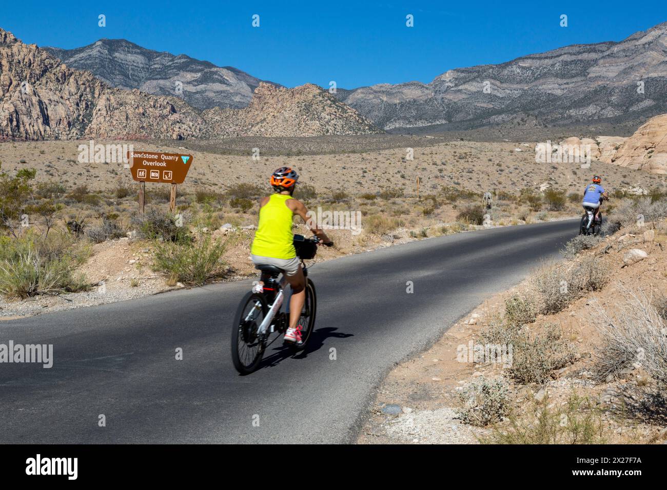 Red Rock Canyon, Nevada. Cyclists on the 17-mile Scenic Drive Stock ...