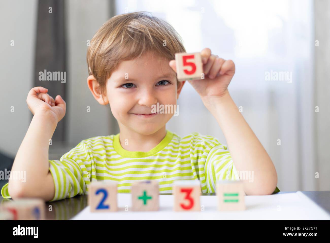 Boy Showing Number Five with Blocks Stock Photo - Alamy