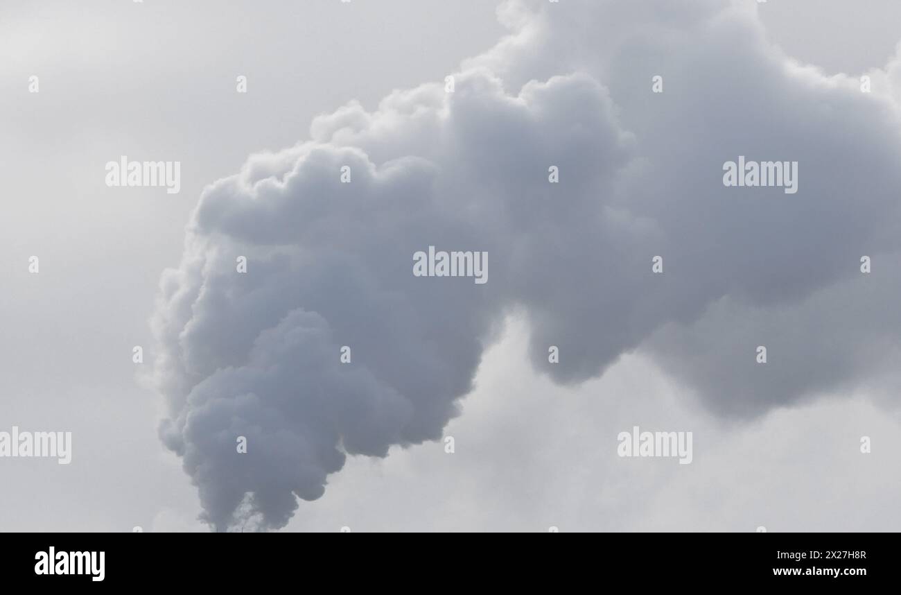 Air pollution with black smoke from chimneys and industrial waste ...