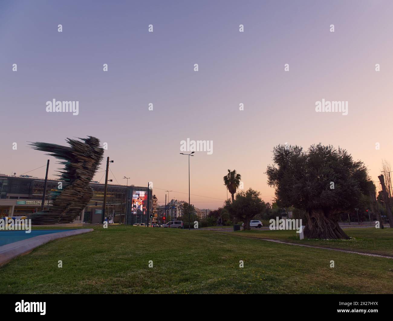 Athens, Greece - April 14, 2024: Low angle view of Athens under sunset ...