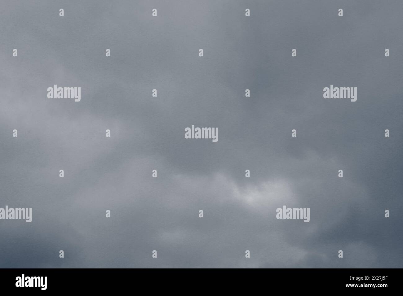 Gloomy gray solid clouds in bad weather. bad weather background, autumn season Stock Photo - Alamy
