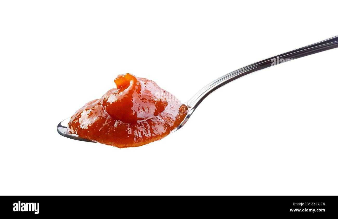 Wooden spoon in fruit jam Cut Out Stock Images & Pictures - Alamy