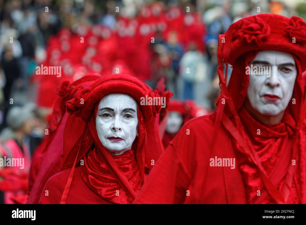 Bath, UK. 20th Apr, 2024. Dressed in their distinctive red rebel ...