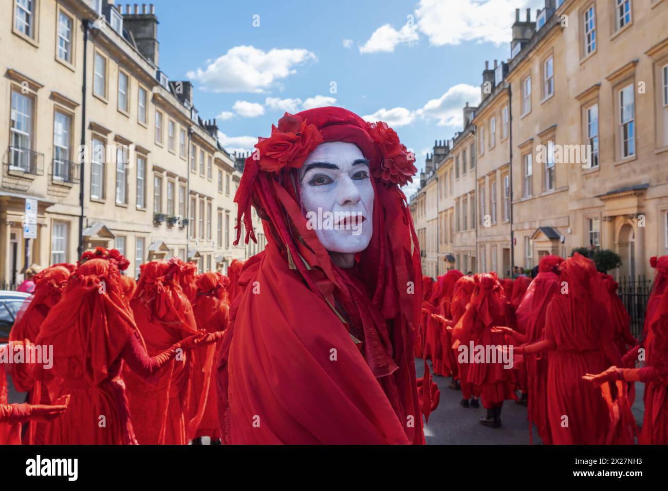 Bath, UK. 20th Apr, 2024. Dressed in their distinctive red rebel ...