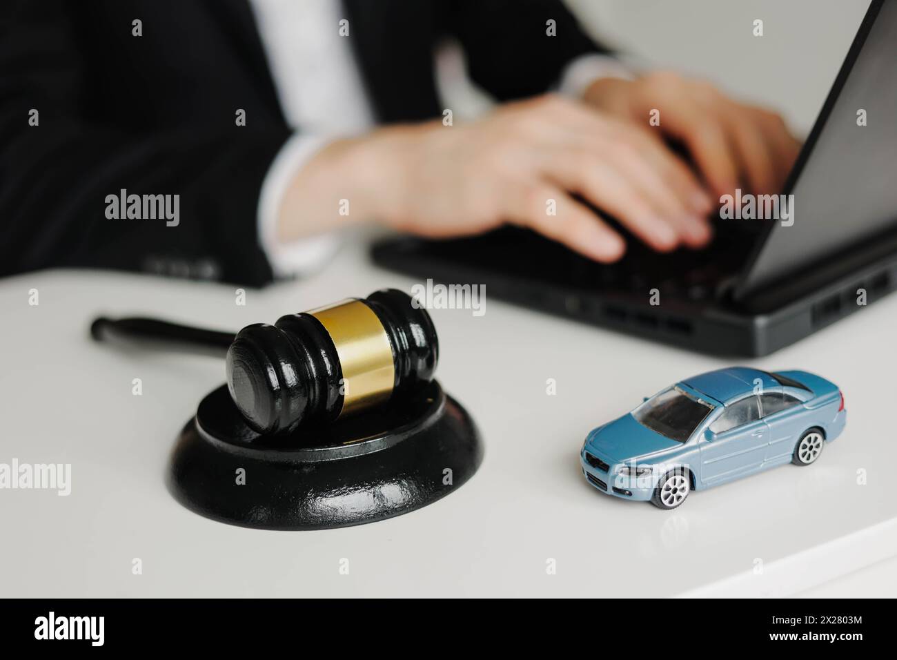 Car Accident Liability Insurance Lawyer And Gavel. Lawyer using laptop ...