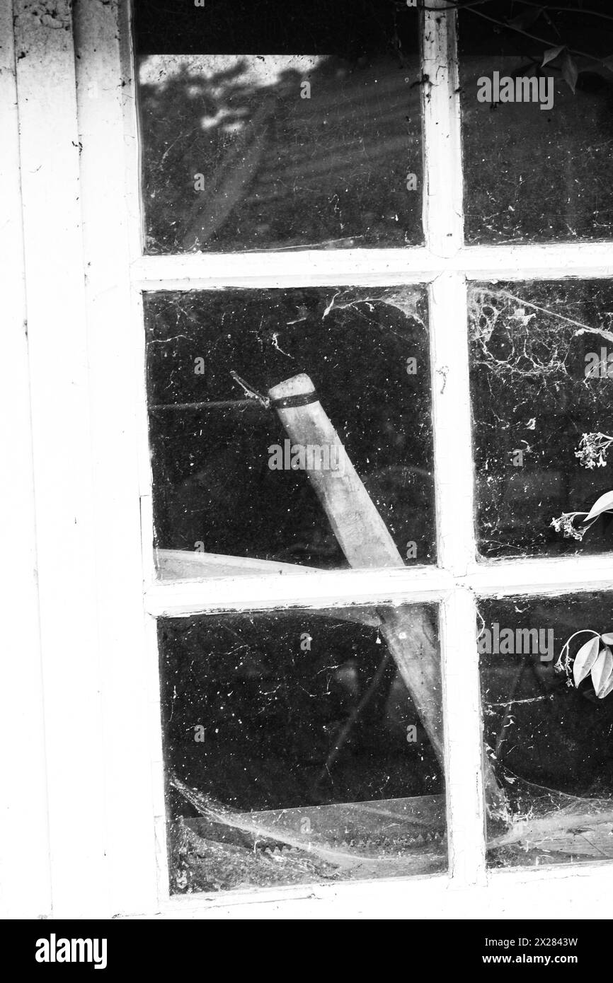 A soft handle is visible through the dusty window Stock Photo - Alamy