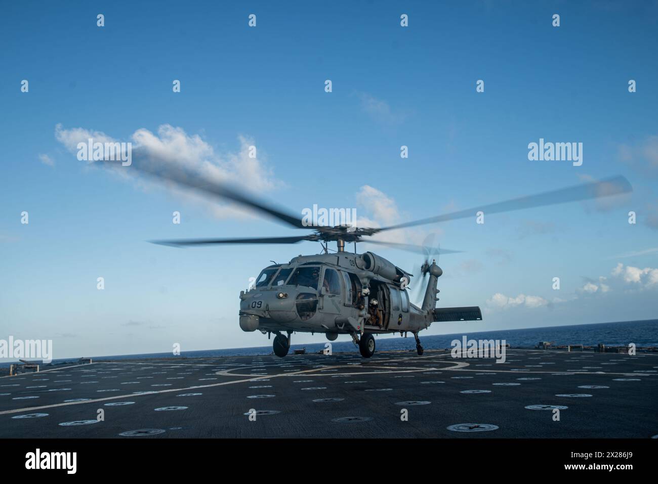 A U.S. Navy MH-60S Sea Hawk attached to Helicopter Sea Combat Squadron ...