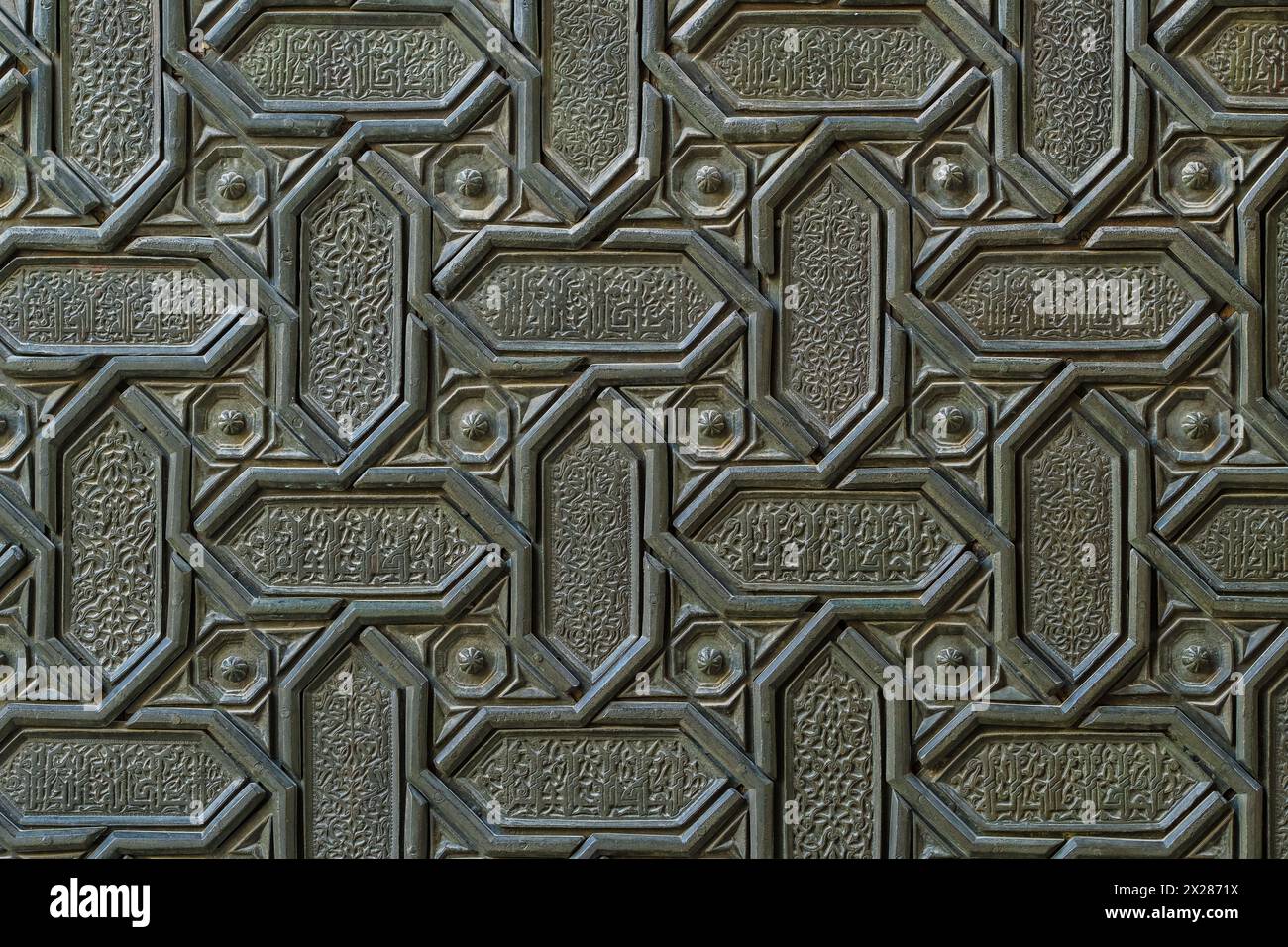 Islamic patterns and Arabic calligraphy of the Seville Cathedral door ...