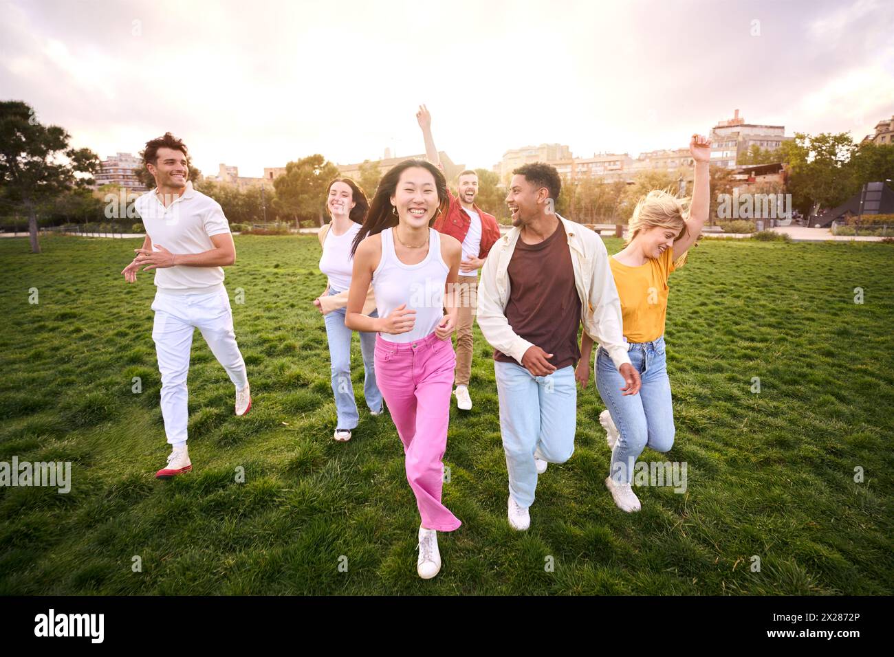 Diverse young group run camera hi-res stock photography and images - Alamy