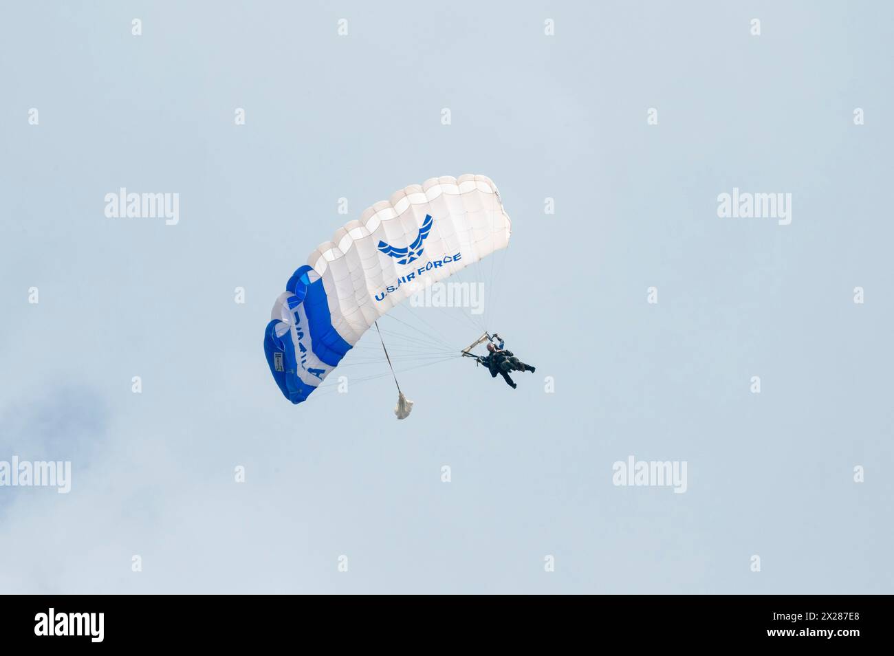 A United States Air Force Academy Wings of Blue member conducts a ...