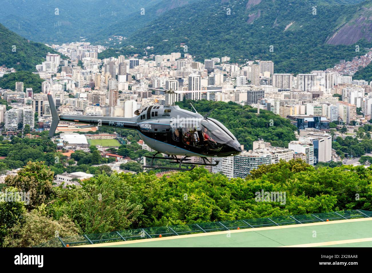 Tourists/Visitors Take A Helicopter Ride To See Christ The Redeemer ...