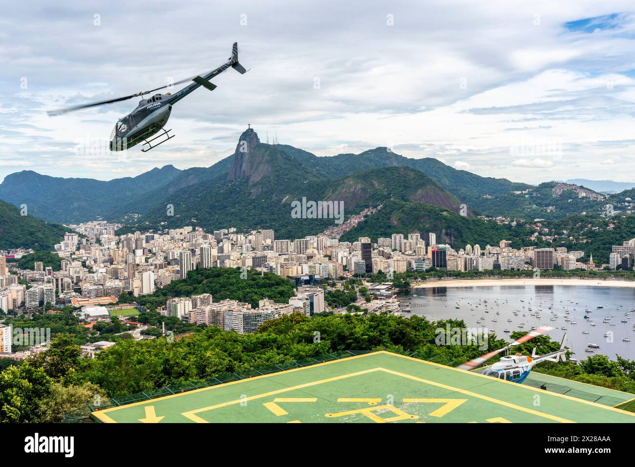 Tourists/Visitors Take A Helicopter Ride To See Christ The Redeemer ...