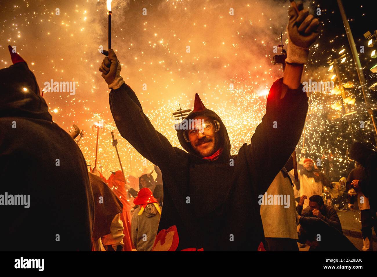 Barcelona, Spain. 20th Apr, 2024. Fire runners dance to traditional ...
