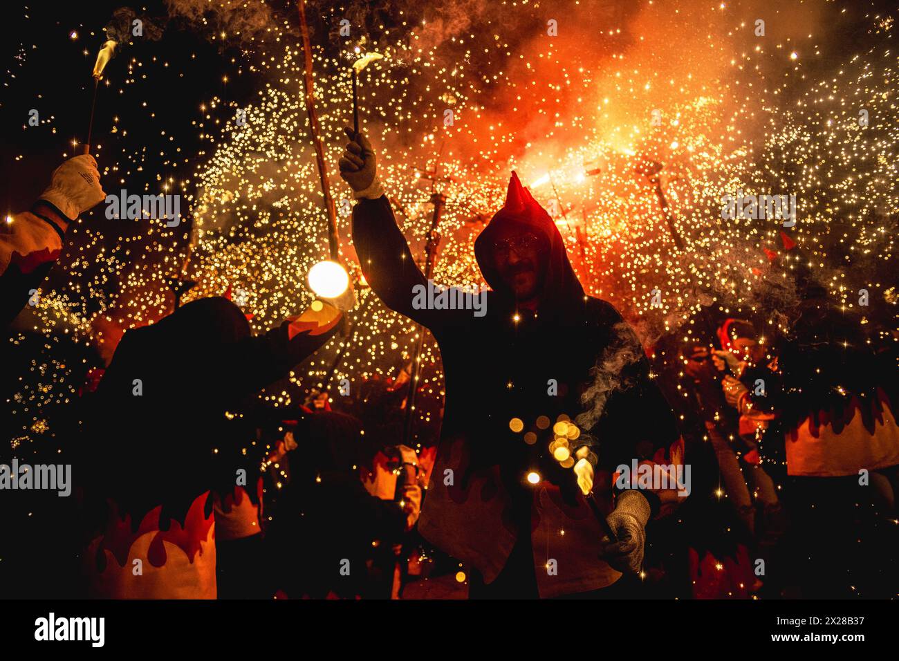 Barcelona, Spain. 20th Apr, 2024. Fire runners dance to traditional ...