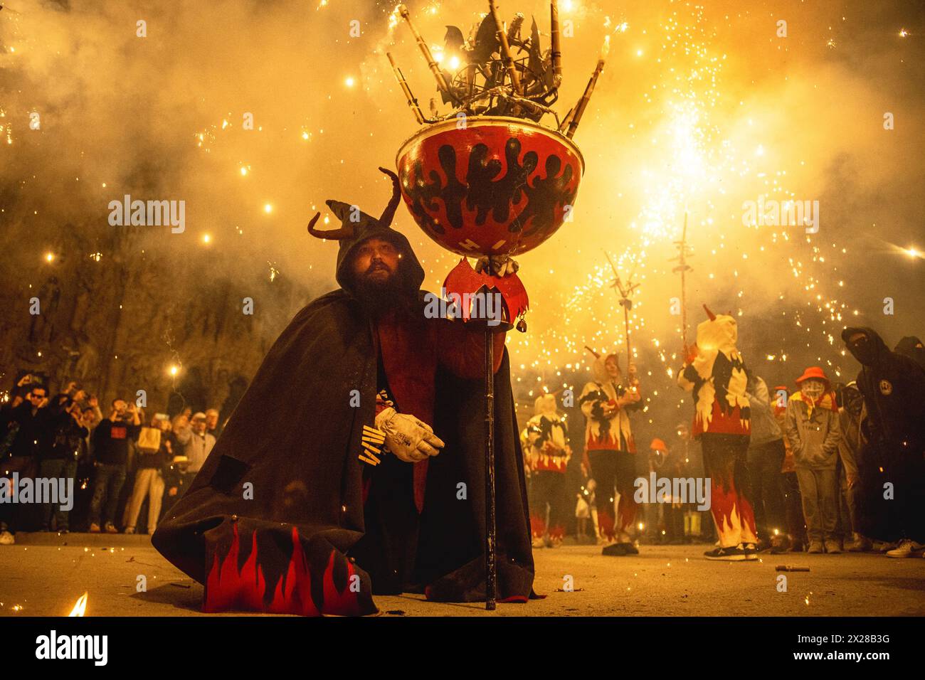 Barcelona, Spain. 20th Apr, 2024. Fire runners dance to traditional ...