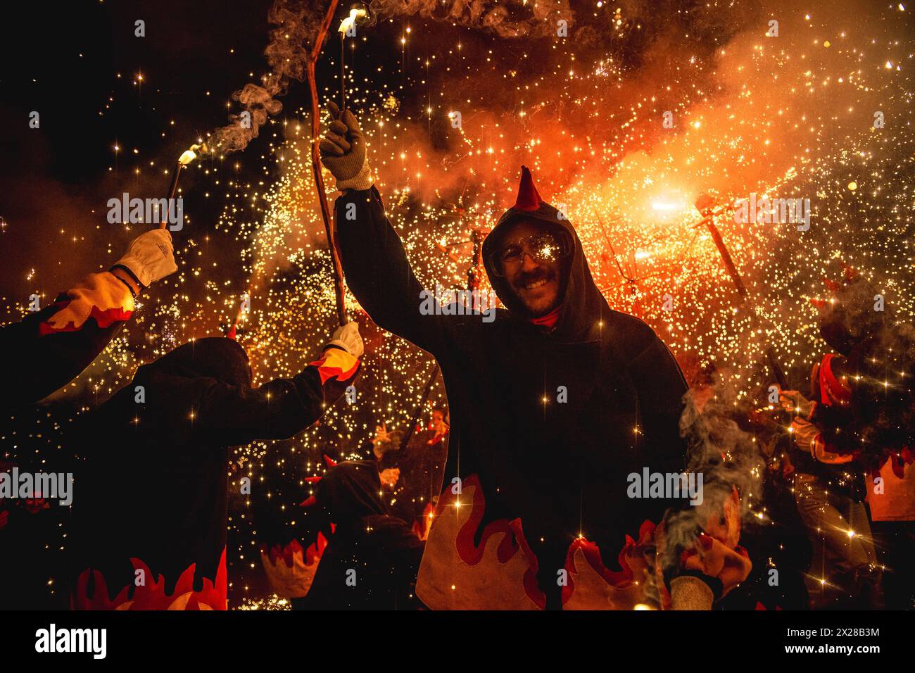 Barcelona, Spain. 20th Apr, 2024. Fire runners dance to traditional ...