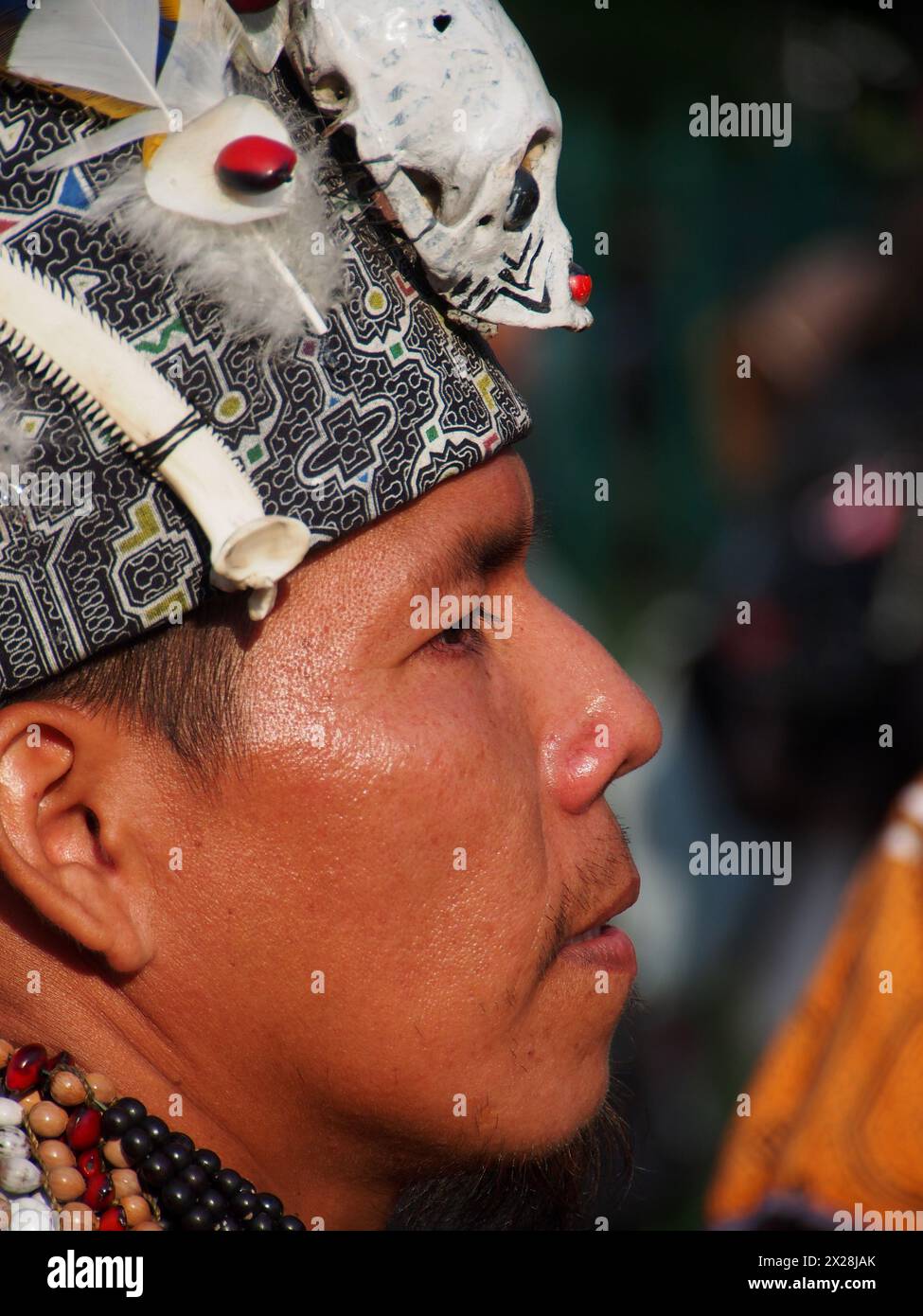 Lima, Peru. 20th Apr, 2024. Amazonian indigenous man with headdress ...