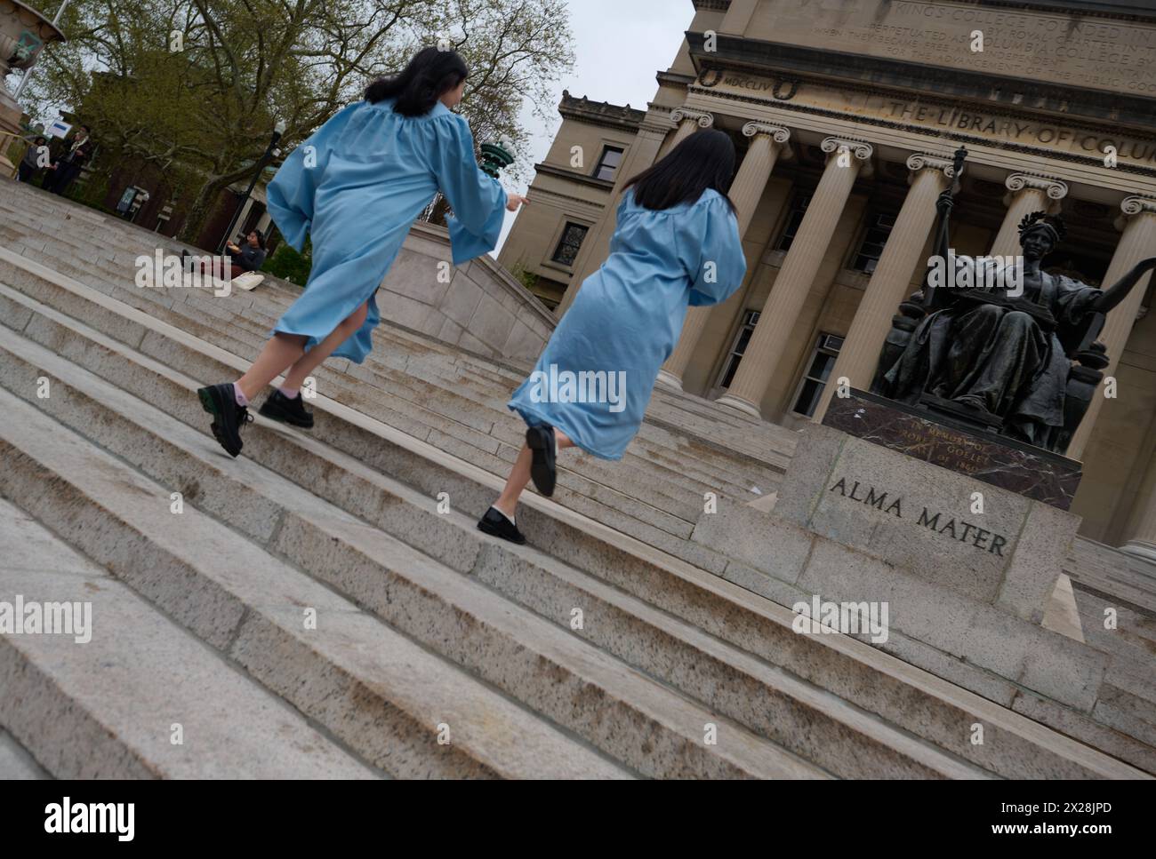 New York, New York, USA. 19th Apr, 2024. Two students in blue ...