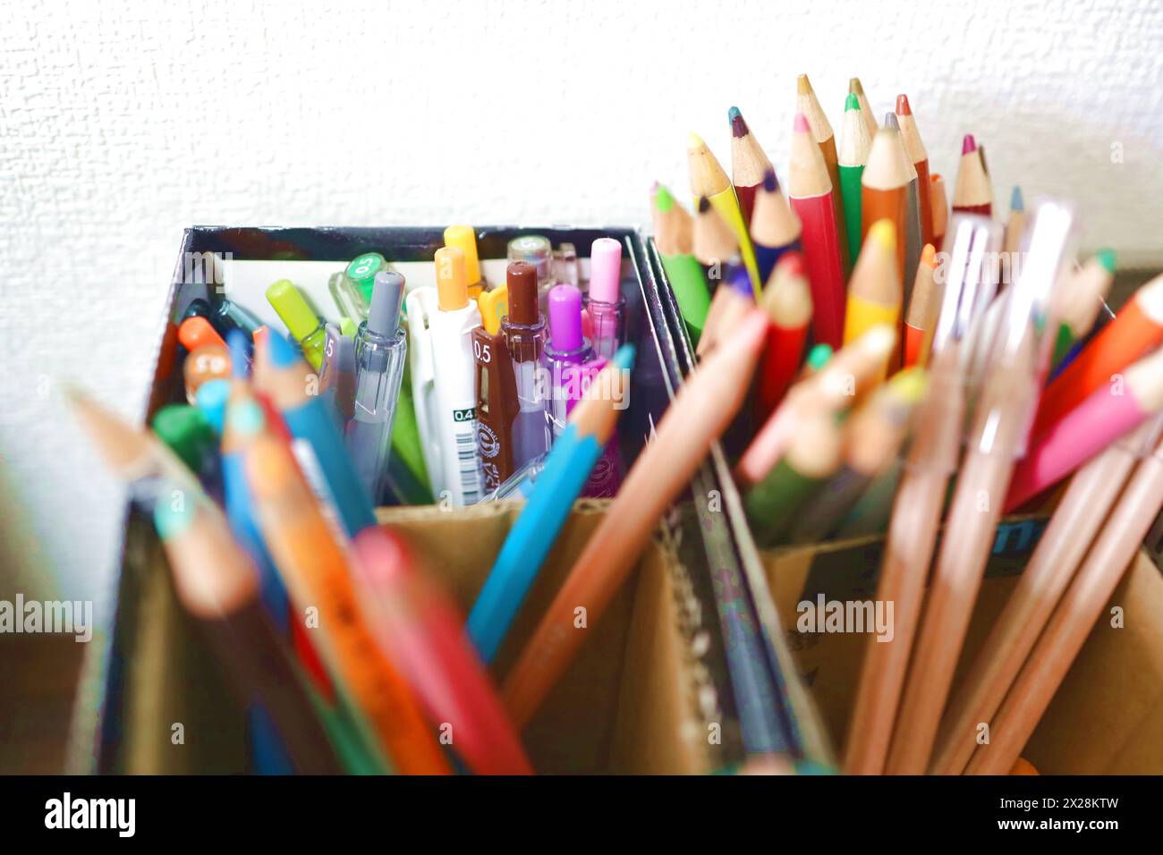 colored pencils in a box Stock Photo - Alamy