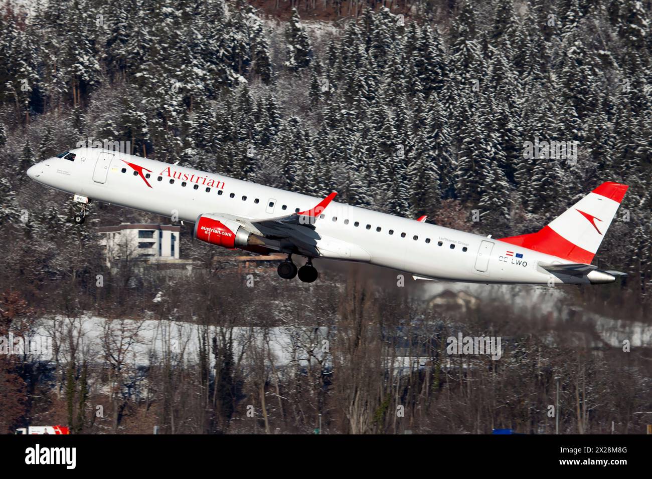 Austrian Airlines Embraer 190 taking off from Innsbruck Kranebitten ...