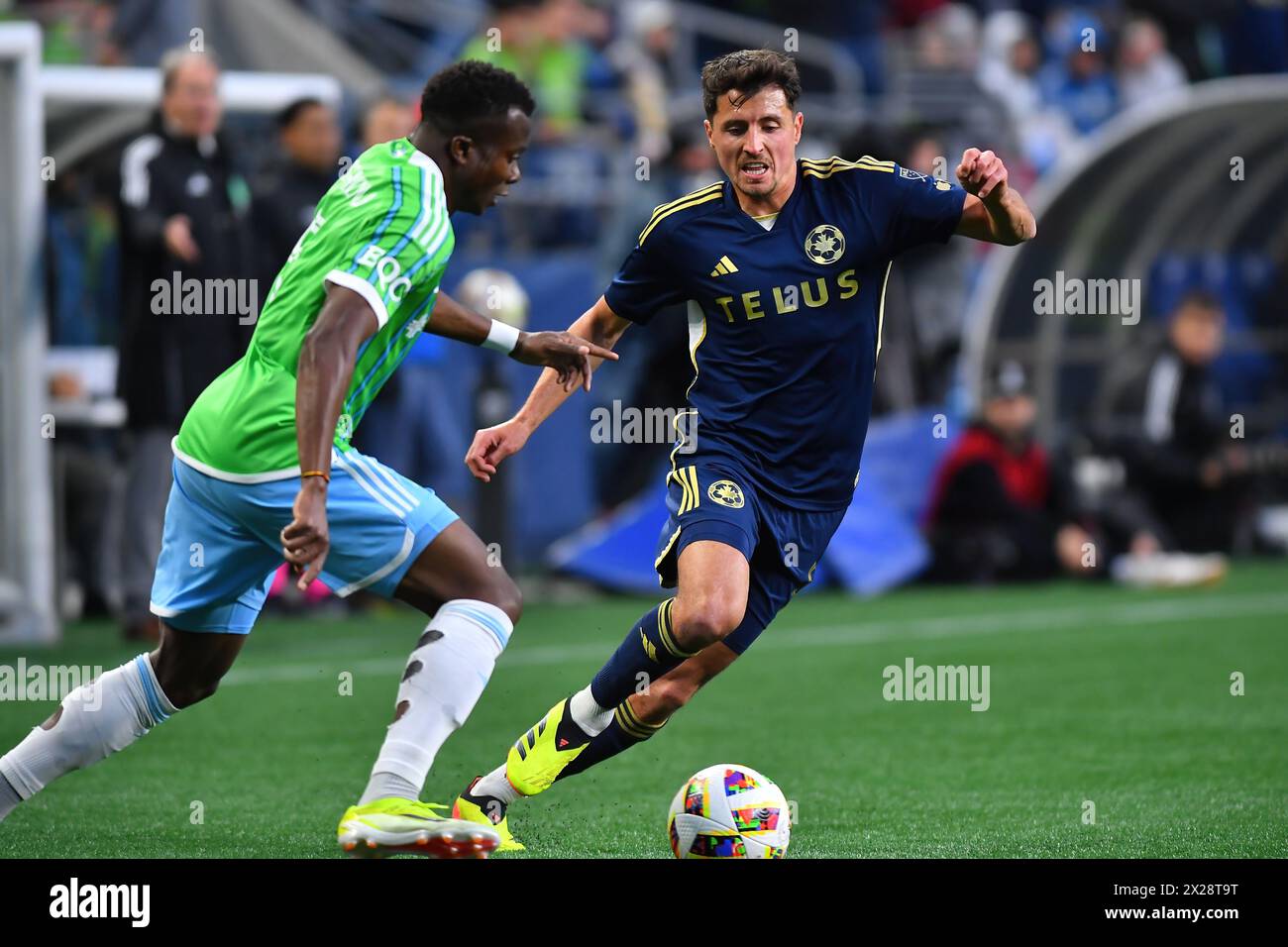 Seattle, WA, USA. 20th Apr, 2024. Seattle Sounders defender Nouhou Tolo (5) and Vancouver ...