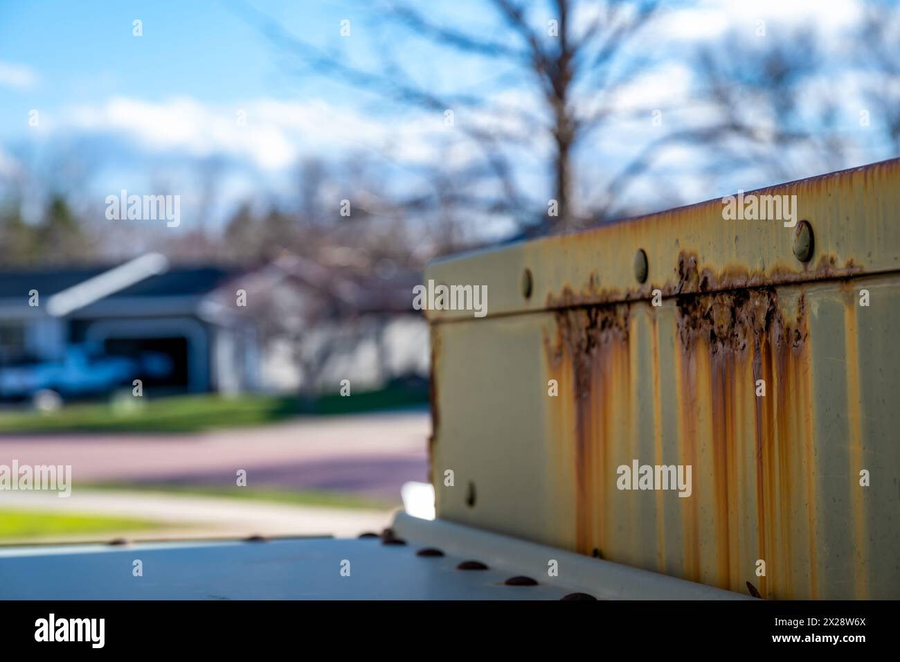 Rusted and peeling paint on an electrical transformer exposed to the ...
