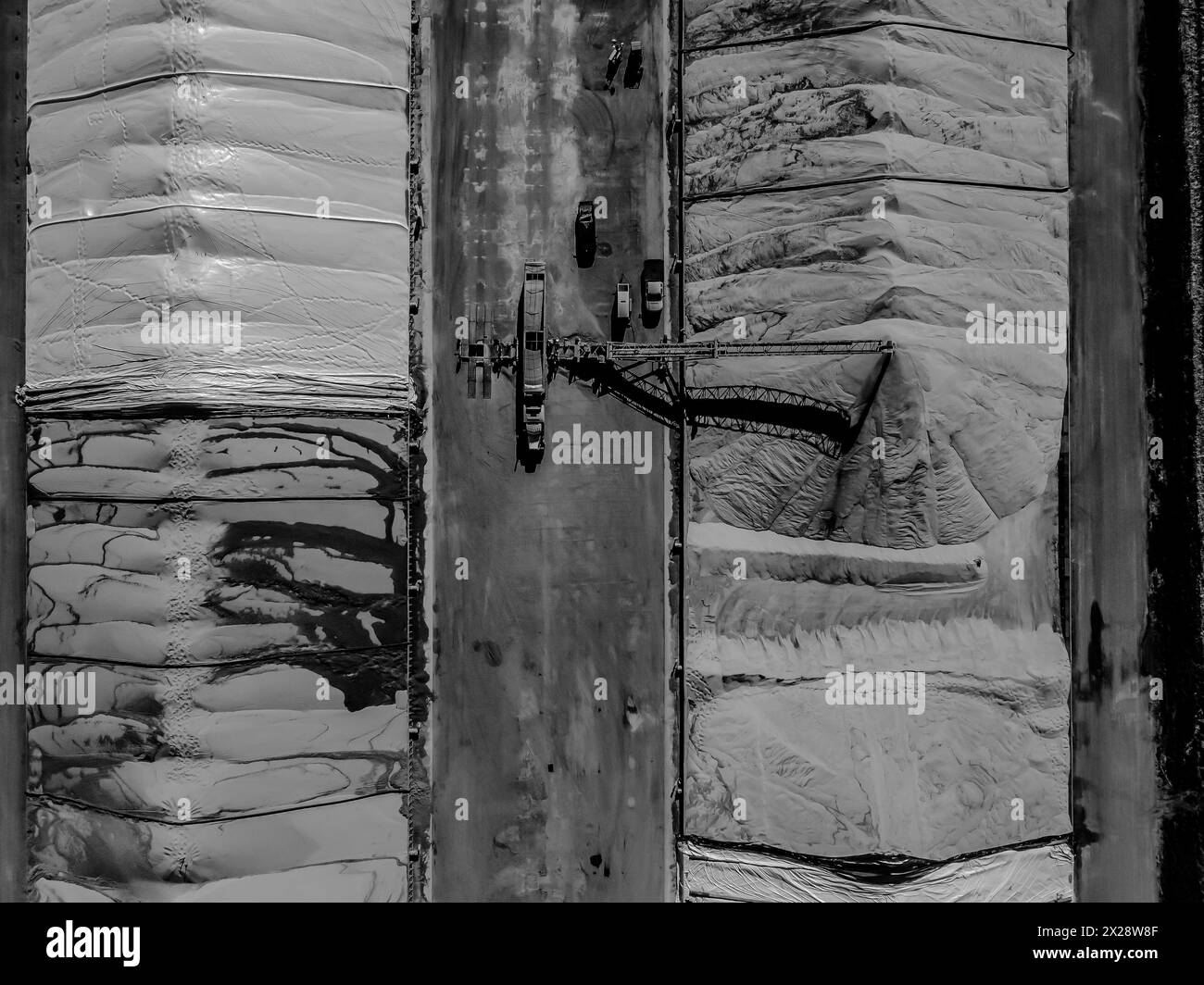 Drone view over grain storage piles being filled and covered Stock ...