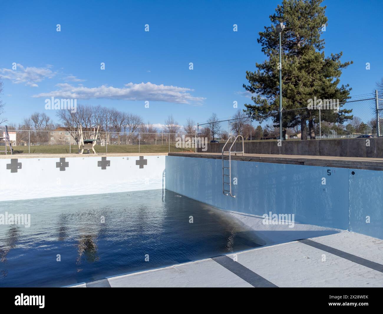 inside an empty and drained winterized swimming pool Stock Photo - Alamy