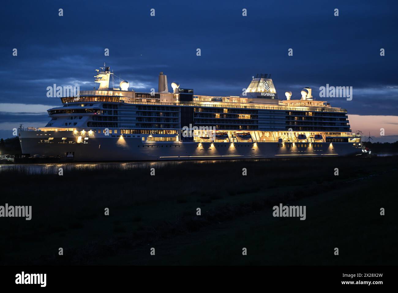 Weener, Germany. 21st Apr, 2024. The luxury liner "Silver Ray" is ...