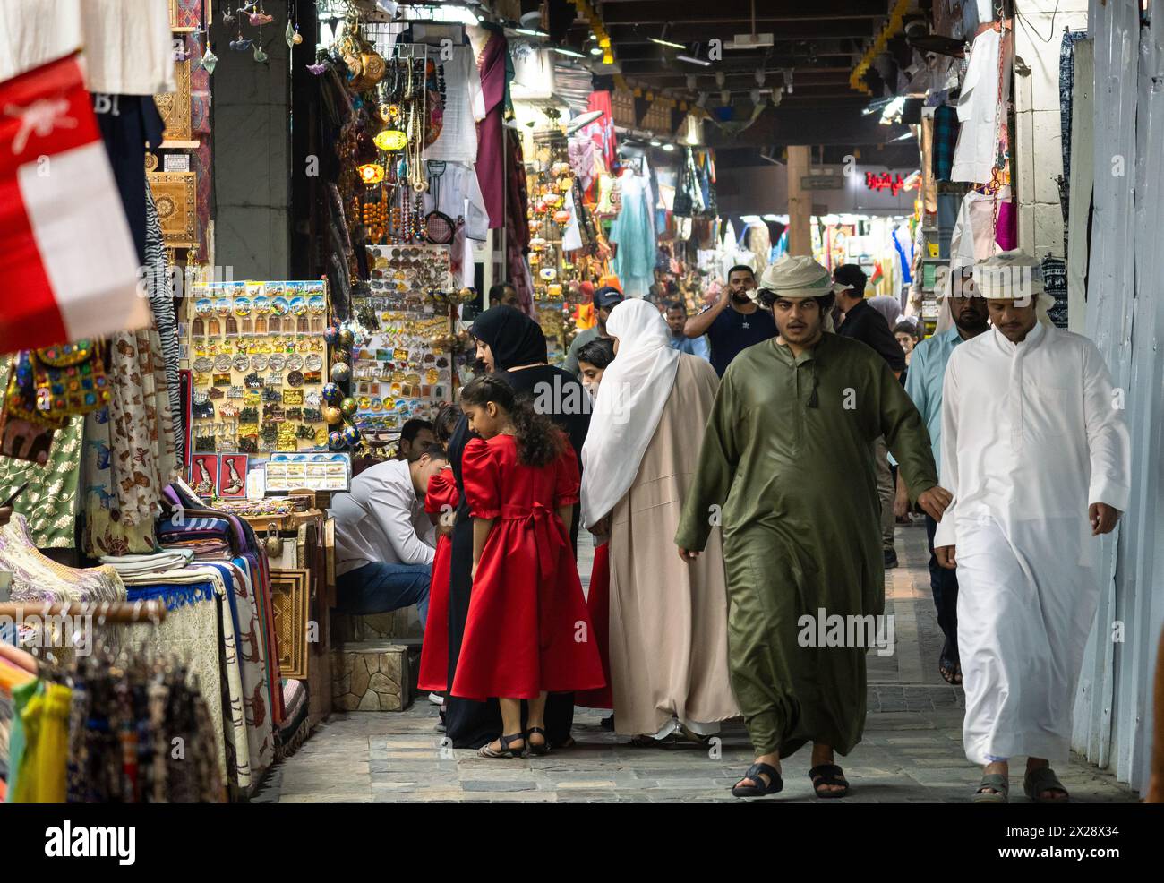 Muscat, Oman - February 13 2023: Arab men wearing the traditional thawb ...