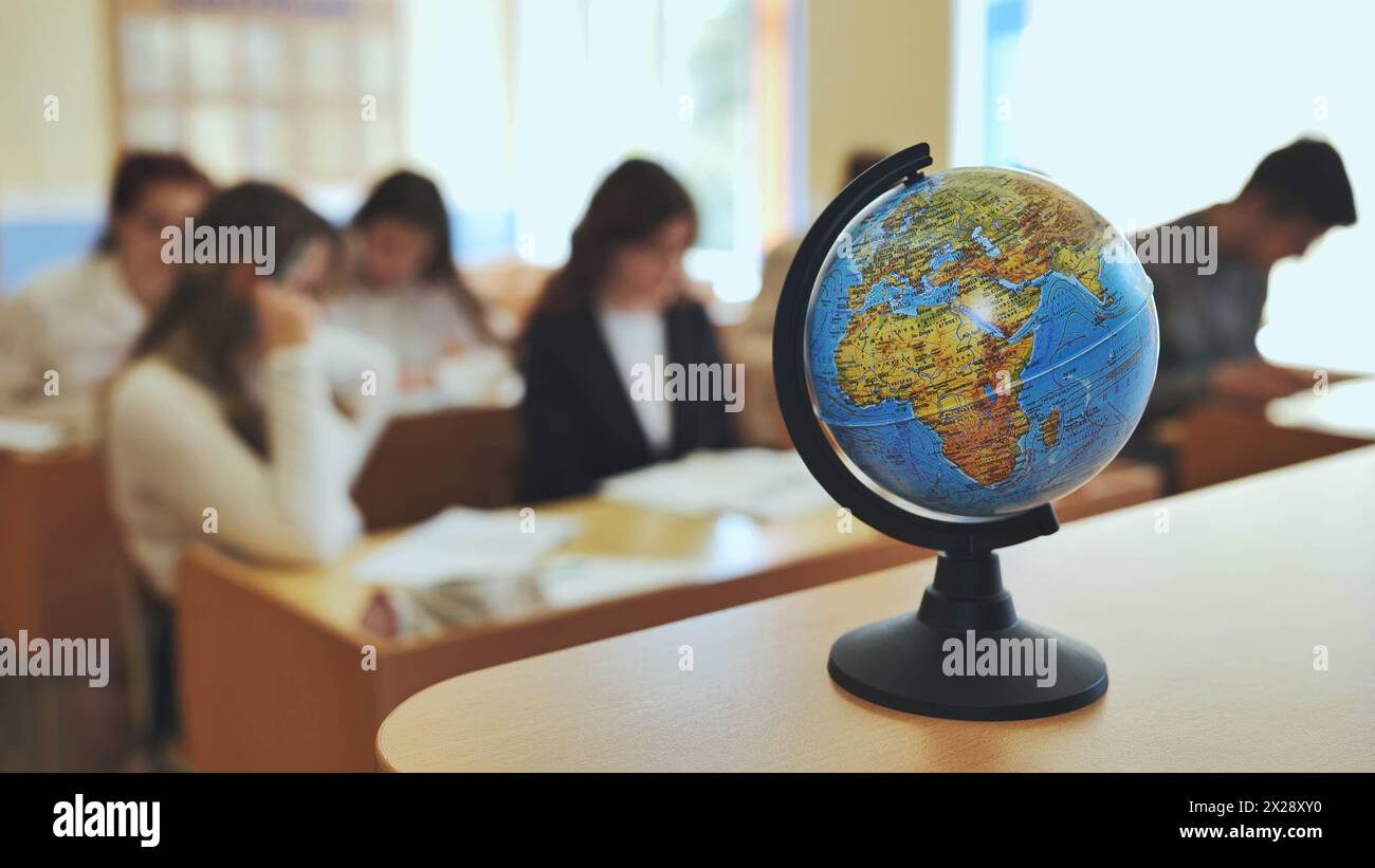A globe of the world in a school classroom during a lesson Stock Photo ...
