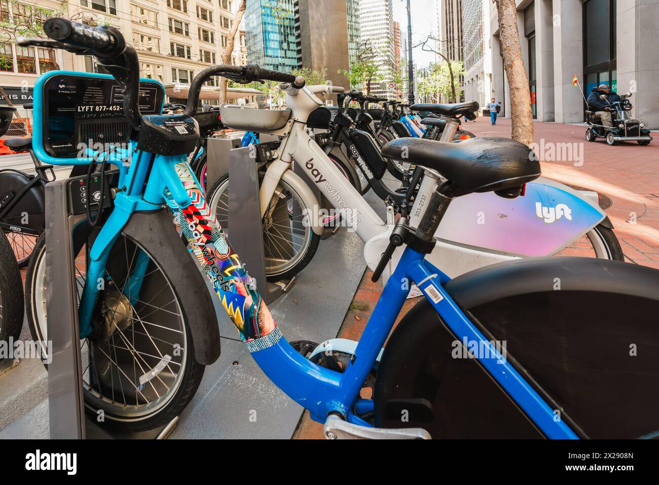 San Francisco, California, April 8, 2024. Docked bikes await riders on ...