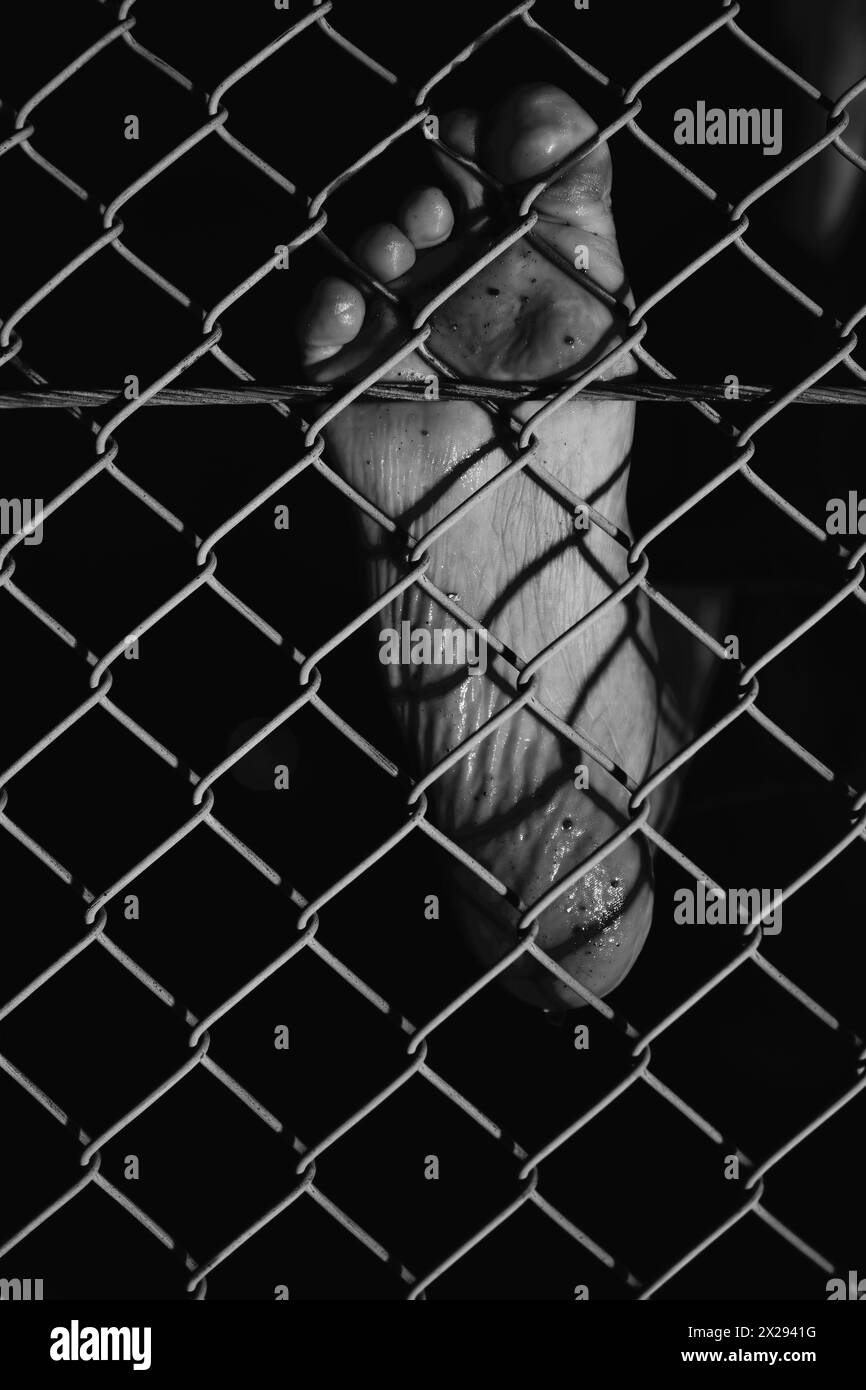 Foot on wall Black and White Stock Photos & Images - Alamy