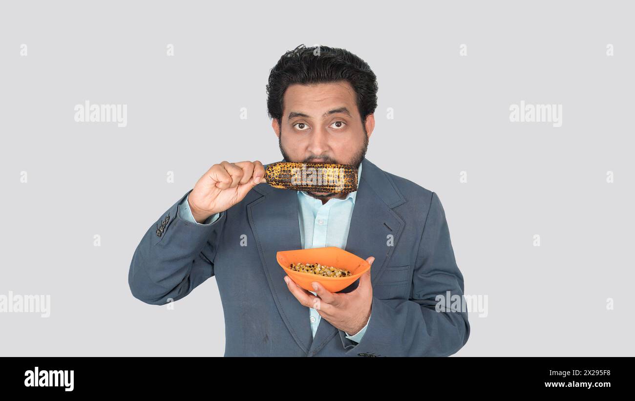 amazing facial expressions of eating a young boy eating corn cob with ...