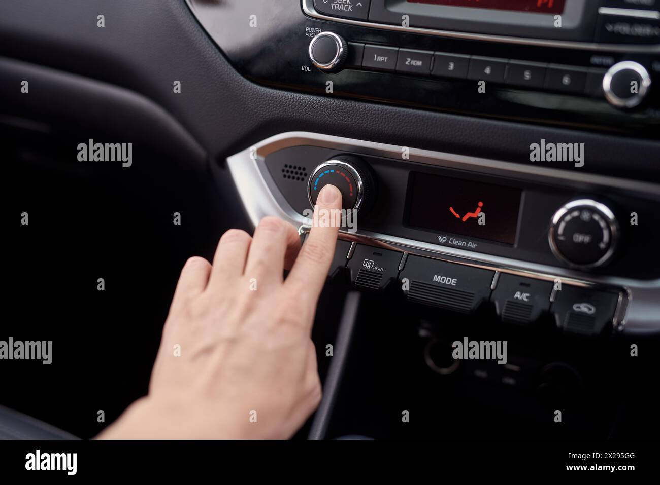 Hand, air conditioning and center console of car for temperature, heat ...