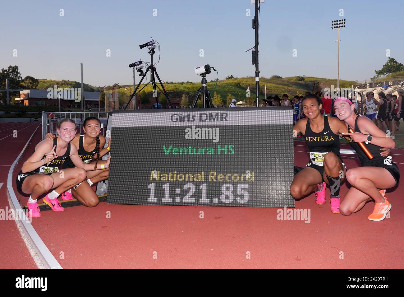 Members of the Ventura girls distance medley relay pose after setting a ...