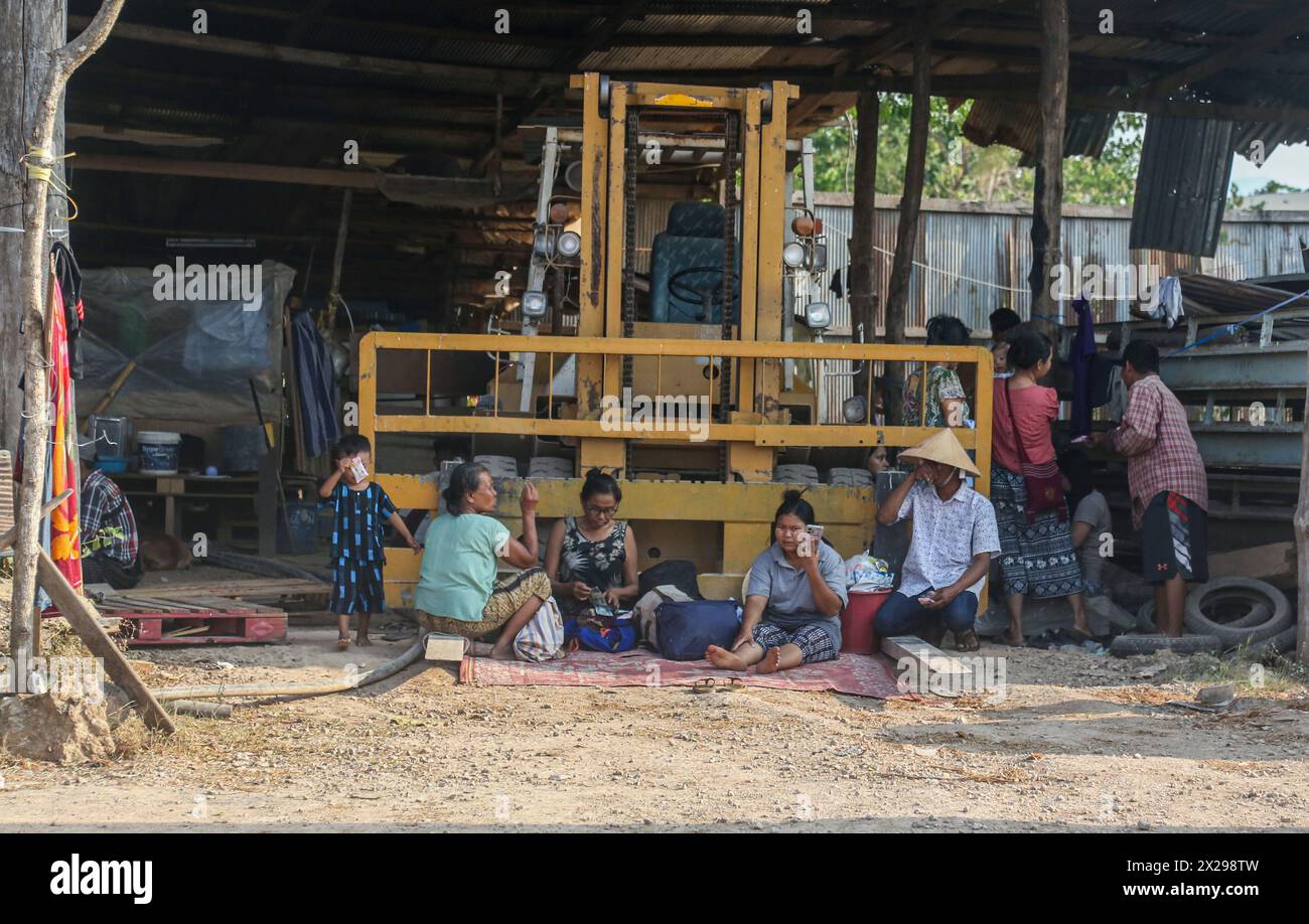 War refugees who flee from the Myawaddy war seen sitting in front of ...