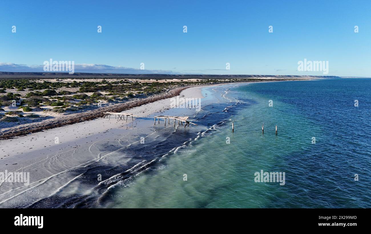 Aerial view of an old, wooden pier at the beach in Eucla, Western ...