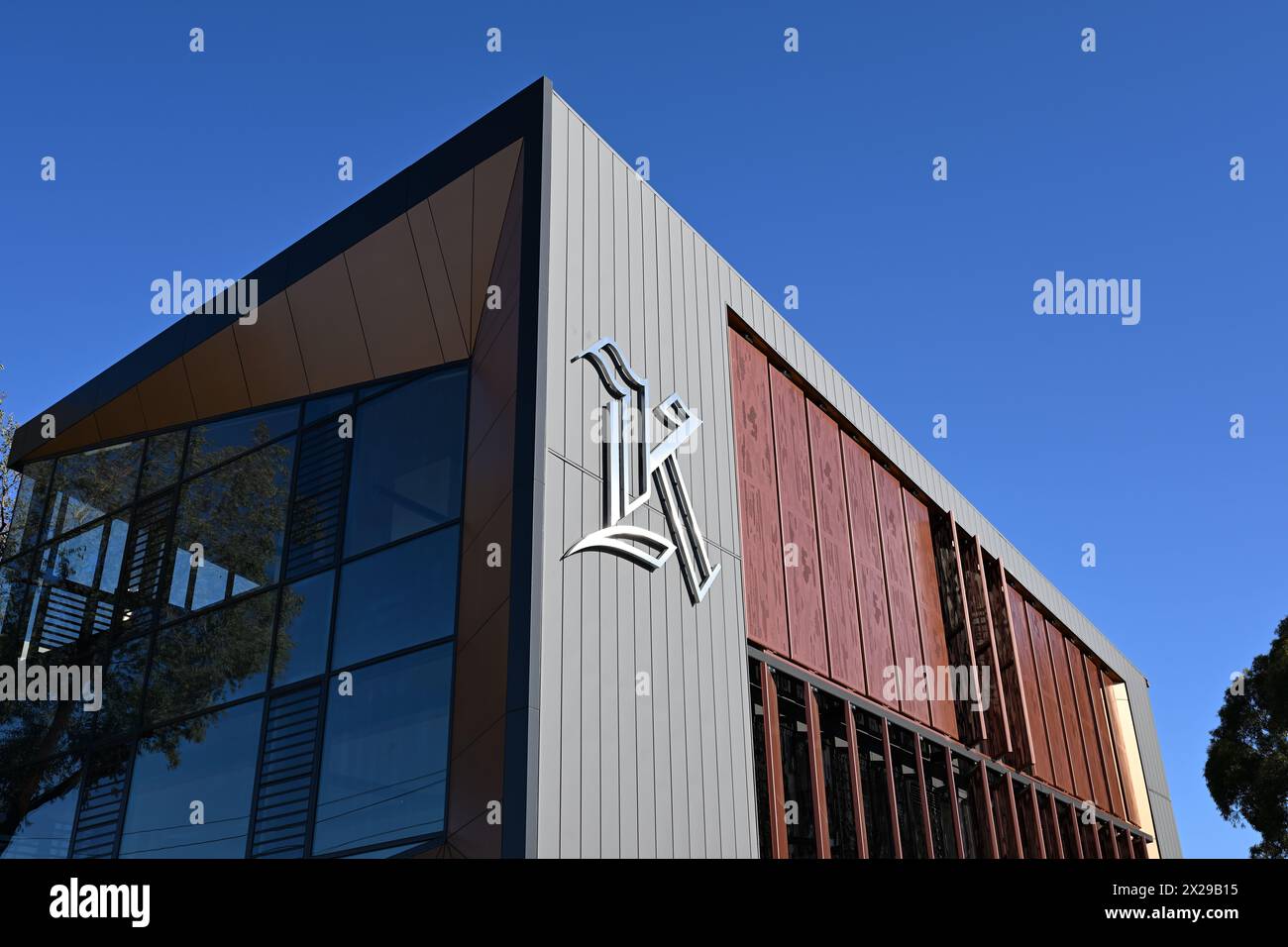 Large K metallic emblem shinning brightly in the sun light on the side ...