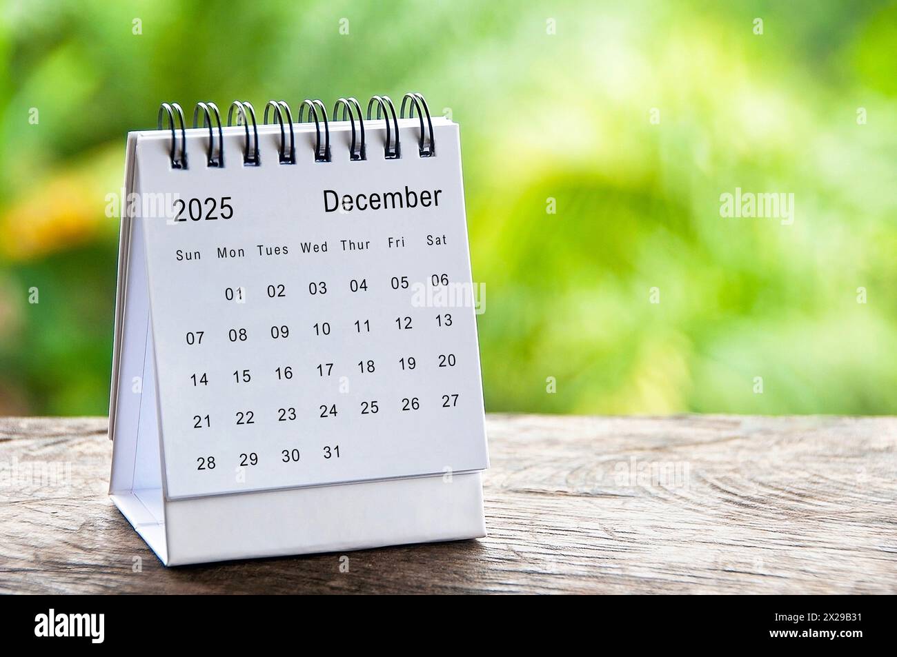 December 2025 white table calendar with customizable space for text ...