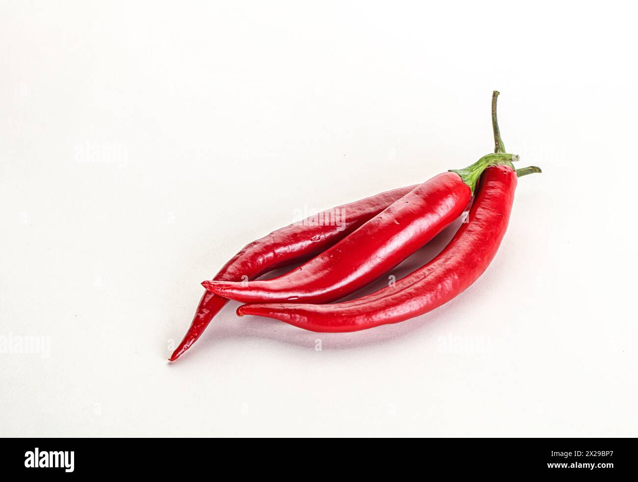 Hot and spicy chili pepper heap Stock Photo - Alamy