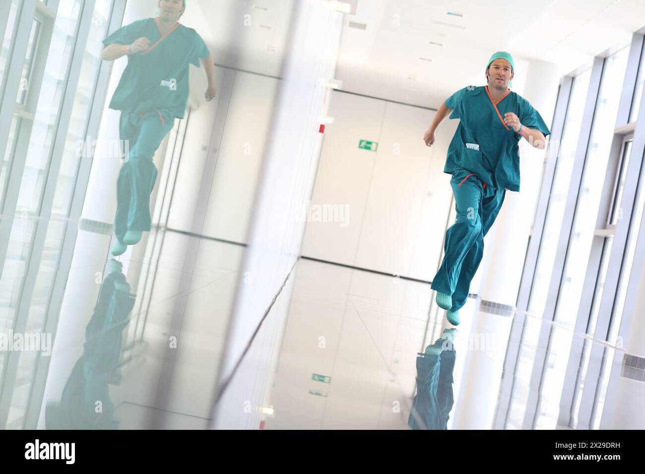 running surgeon in the operating room hallway, Onkologikoa Hospital ...