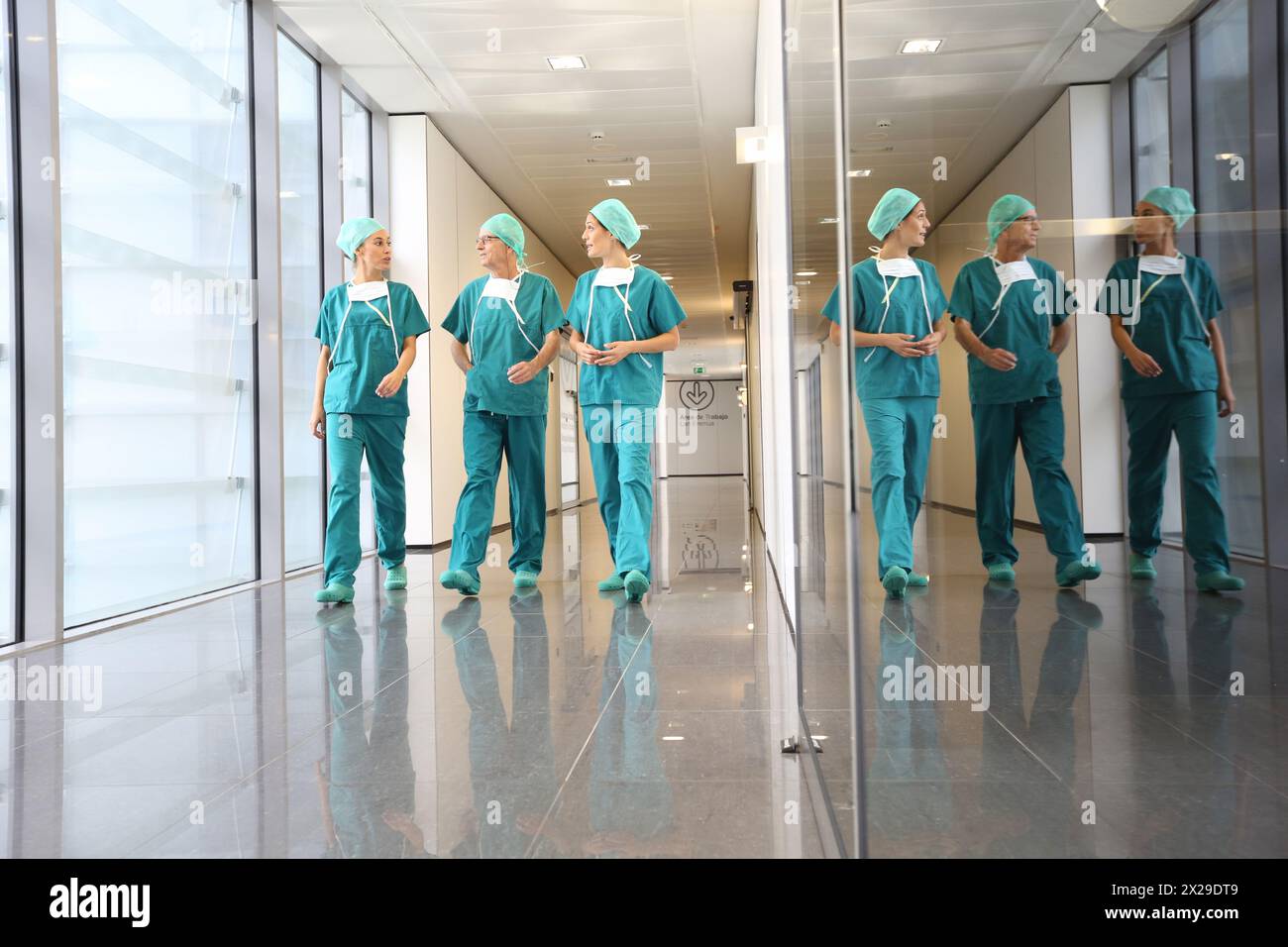 surgeons walking in the operating room hallway, Onkologikoa Hospital ...