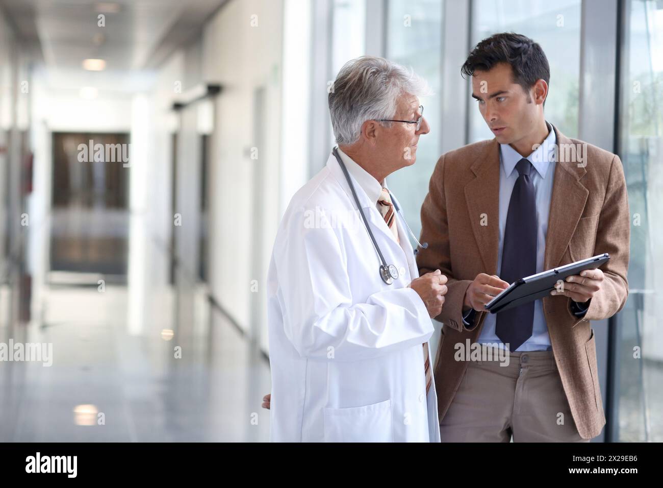 Doctor attending to seller, Corridor, Onkologikoa Hospital, Oncology ...