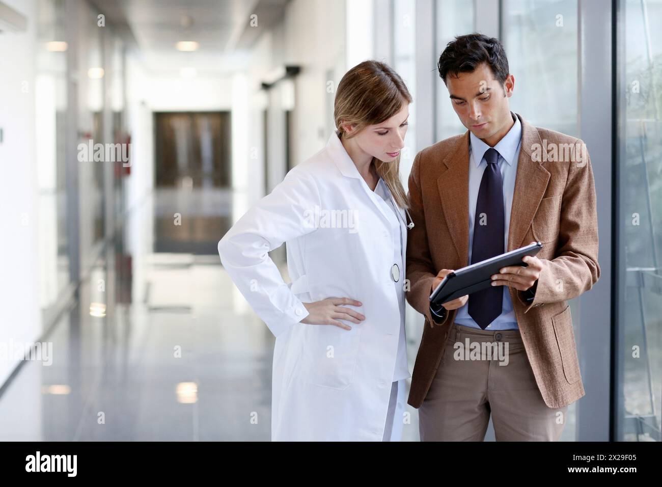 Doctor attending to seller, Corridor, Onkologikoa Hospital, Oncology ...