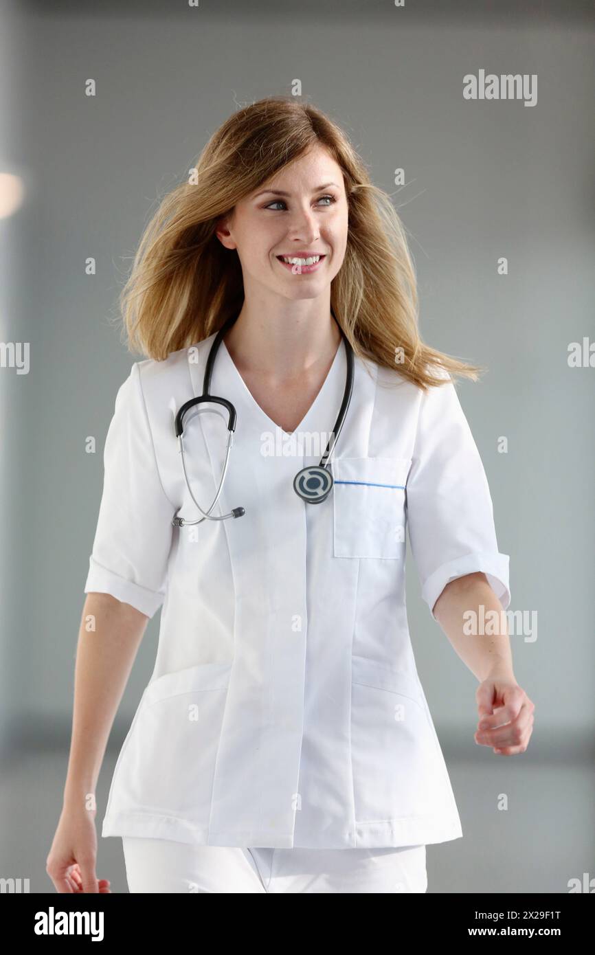 Nurse walking in corridor, Onkologikoa Hospital, Oncology Institute ...