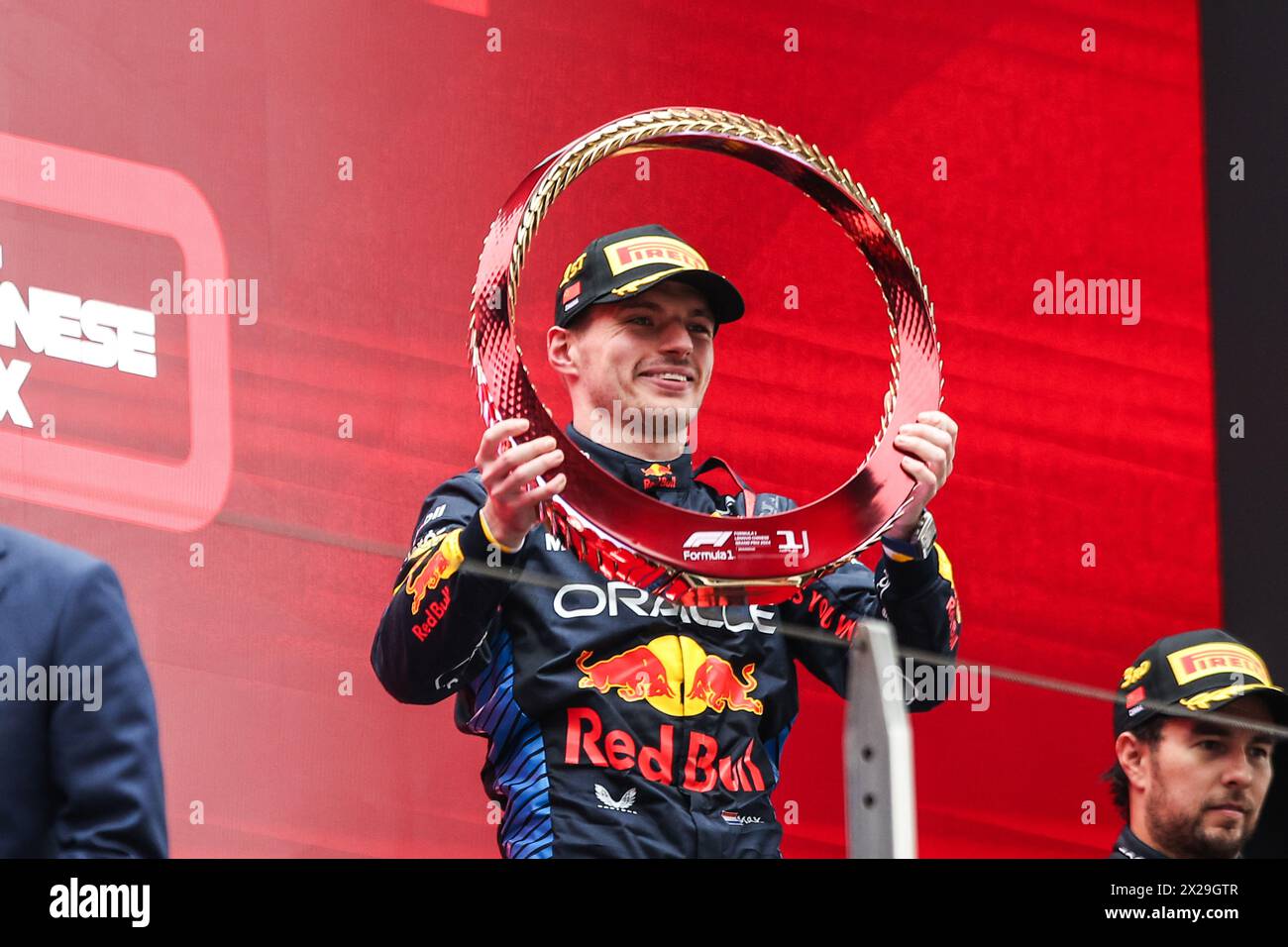 VERSTAPPEN Max (ned), Red Bull Racing RB20, portrait podium trophy ...