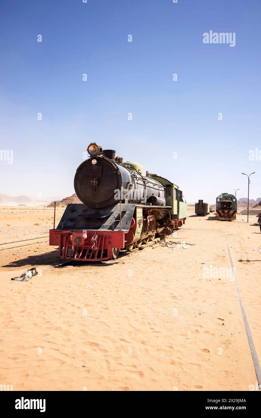 the hijaz railway station, steam train and tracks in the desert at wadi ...