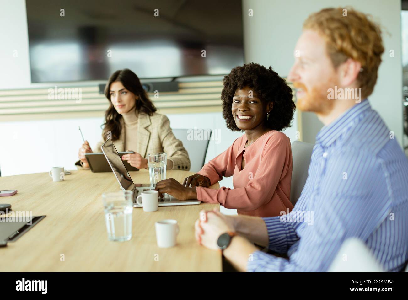 Group of professionals engaging in a productive meeting, exchanging ...